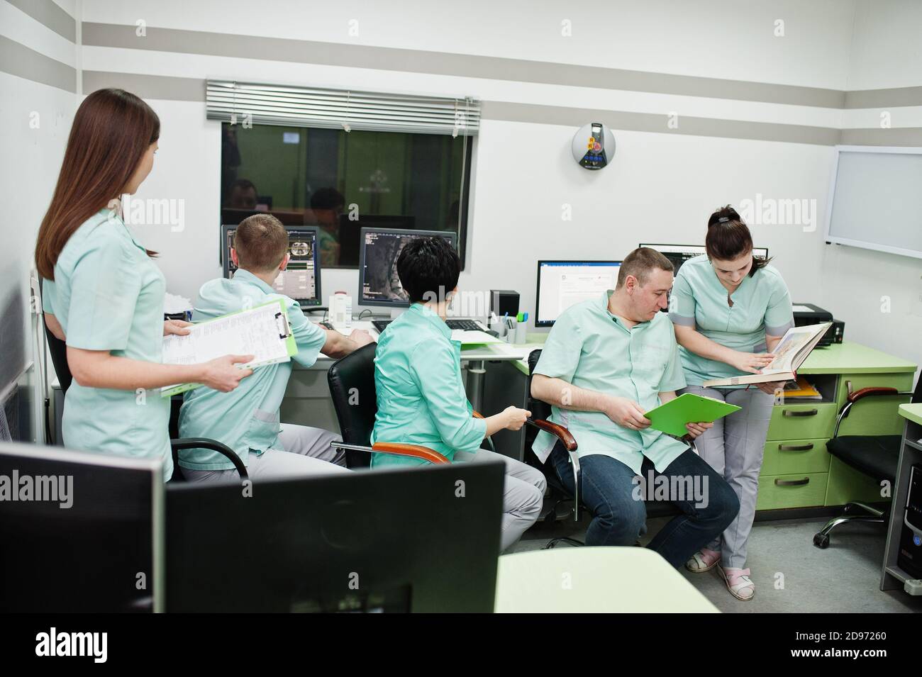 Medical theme.Observation room with a computer tomograph. The group of ...