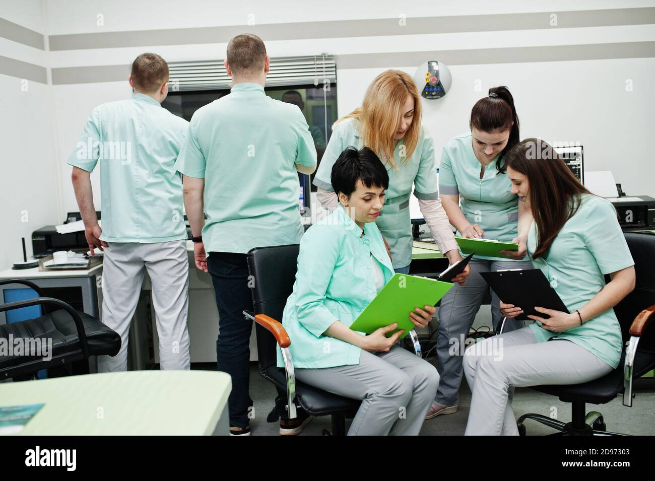 Medical theme.Observation room with a computer tomograph. The group of ...