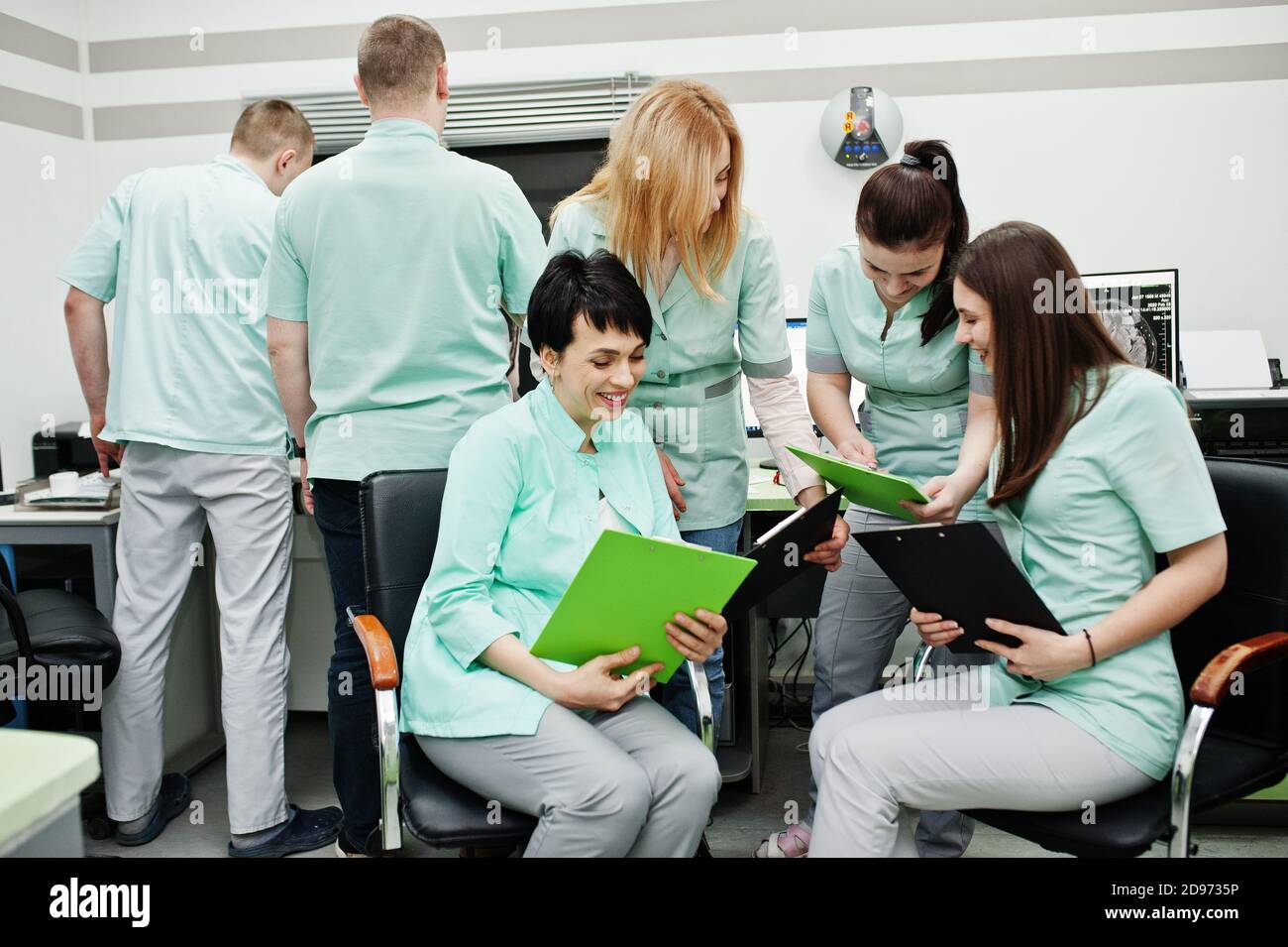 Medical theme.Observation room with a computer tomograph. The group of ...