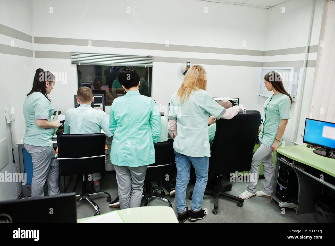 Medical theme.Observation room with a computer tomograph. The group of ...