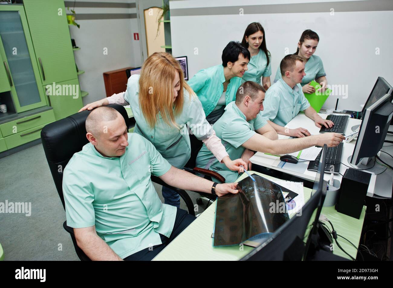 Medical theme.Observation room with a computer tomograph. The group of ...