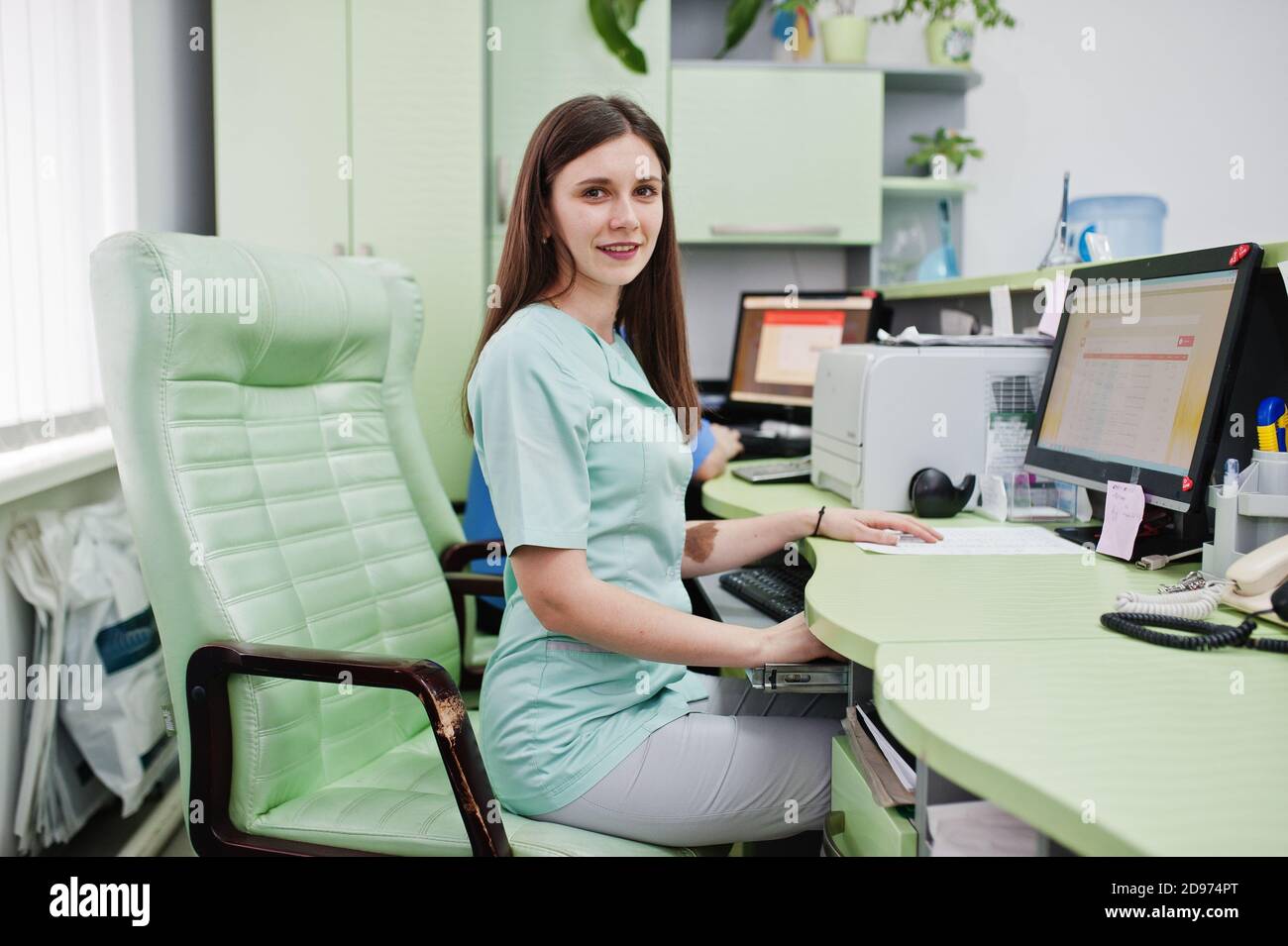 Medical theme. Doctor sitting on chair on reception of diagnostic ...