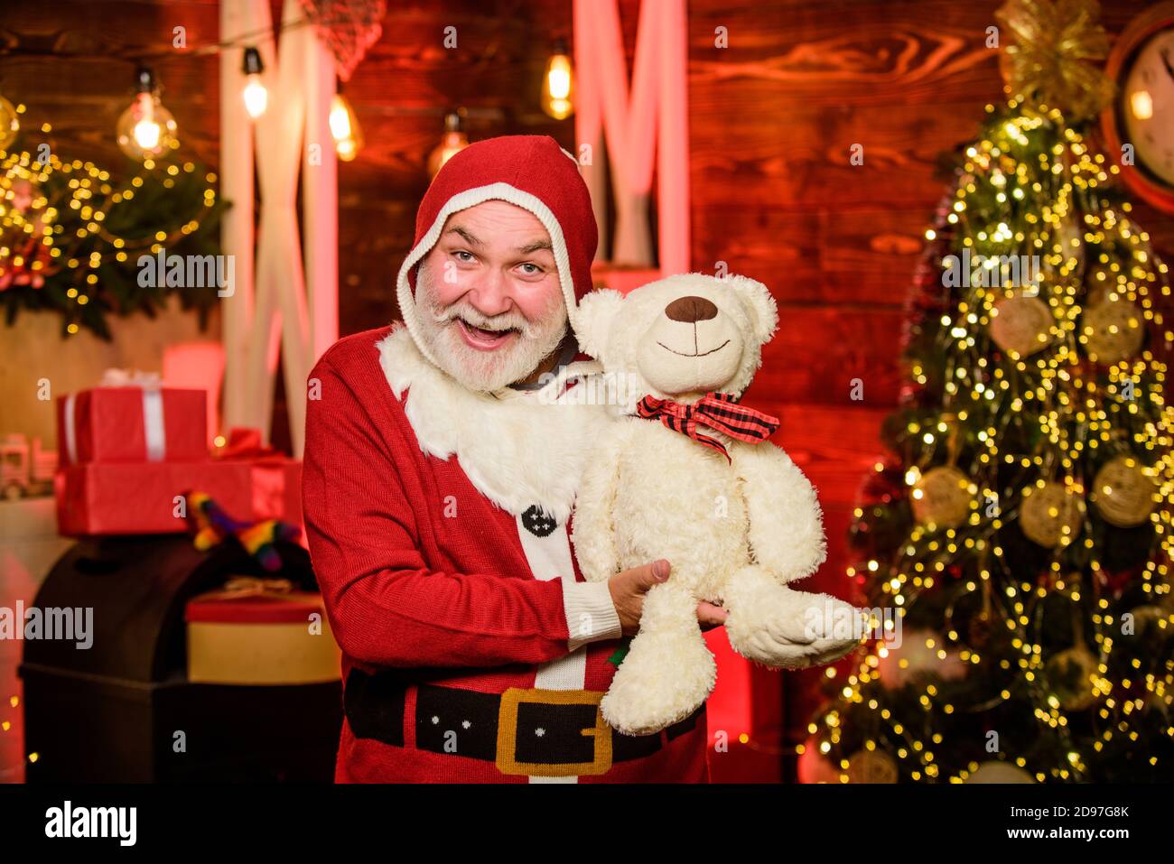 Christmas composition. holiday shopping online. cheerful santa man hold ...