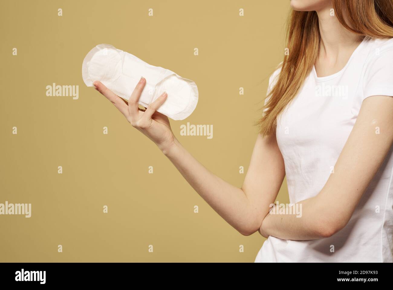 Woman with pad in hand menstruation critical days clean appearance ...