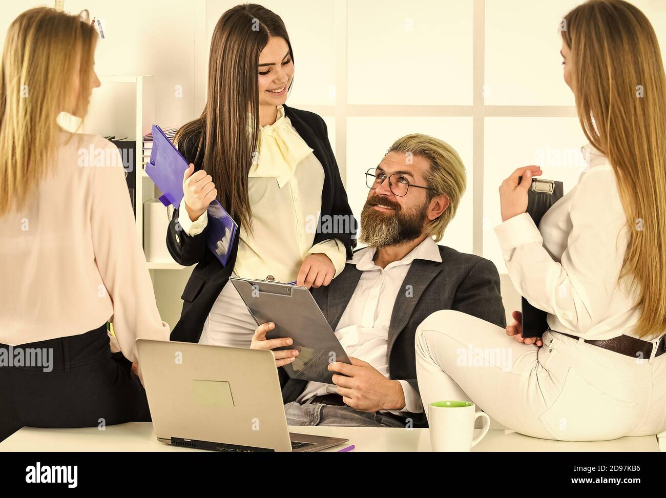 Flirting with boss. Surrounded by beautiful ladies. Man and women ... Flirting with boss. Surrounded by beautiful ladies. Man and women ...