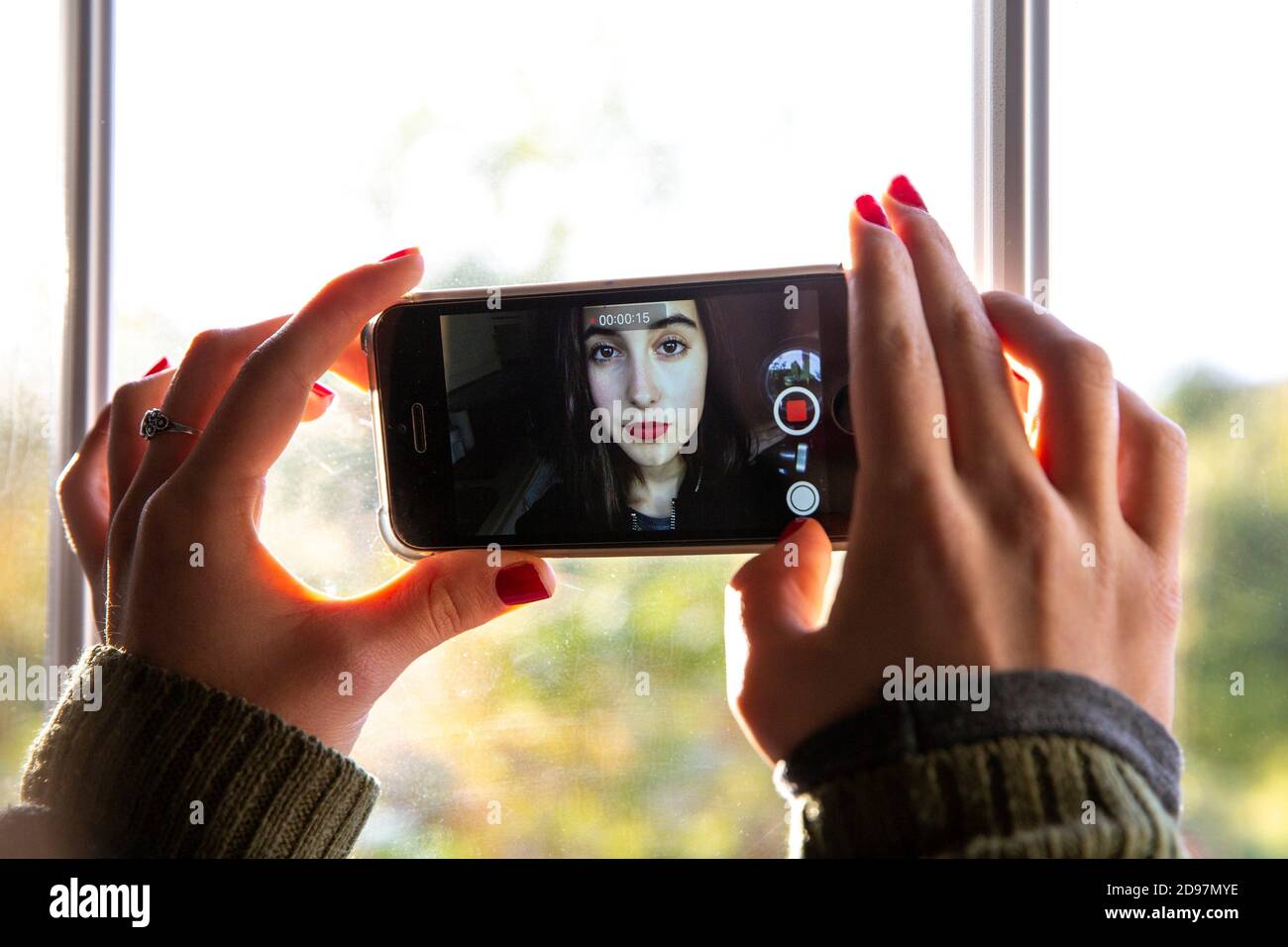 Woman recording herself hi-res stock photography and images - Alamy