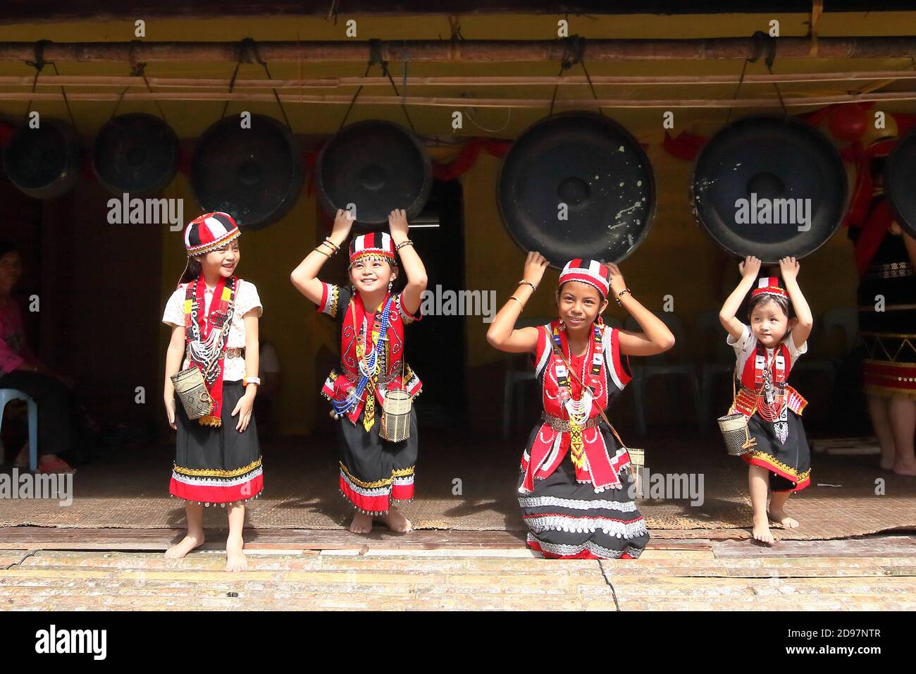 Celebrating Gawai with traditional costume at long house near kuching ...