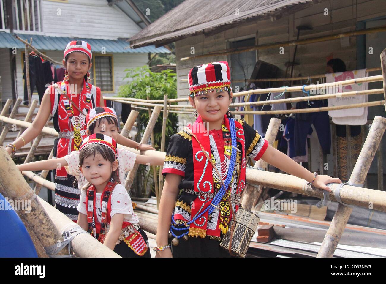 Celebrating Gawai with traditional costume at long house near kuching ...