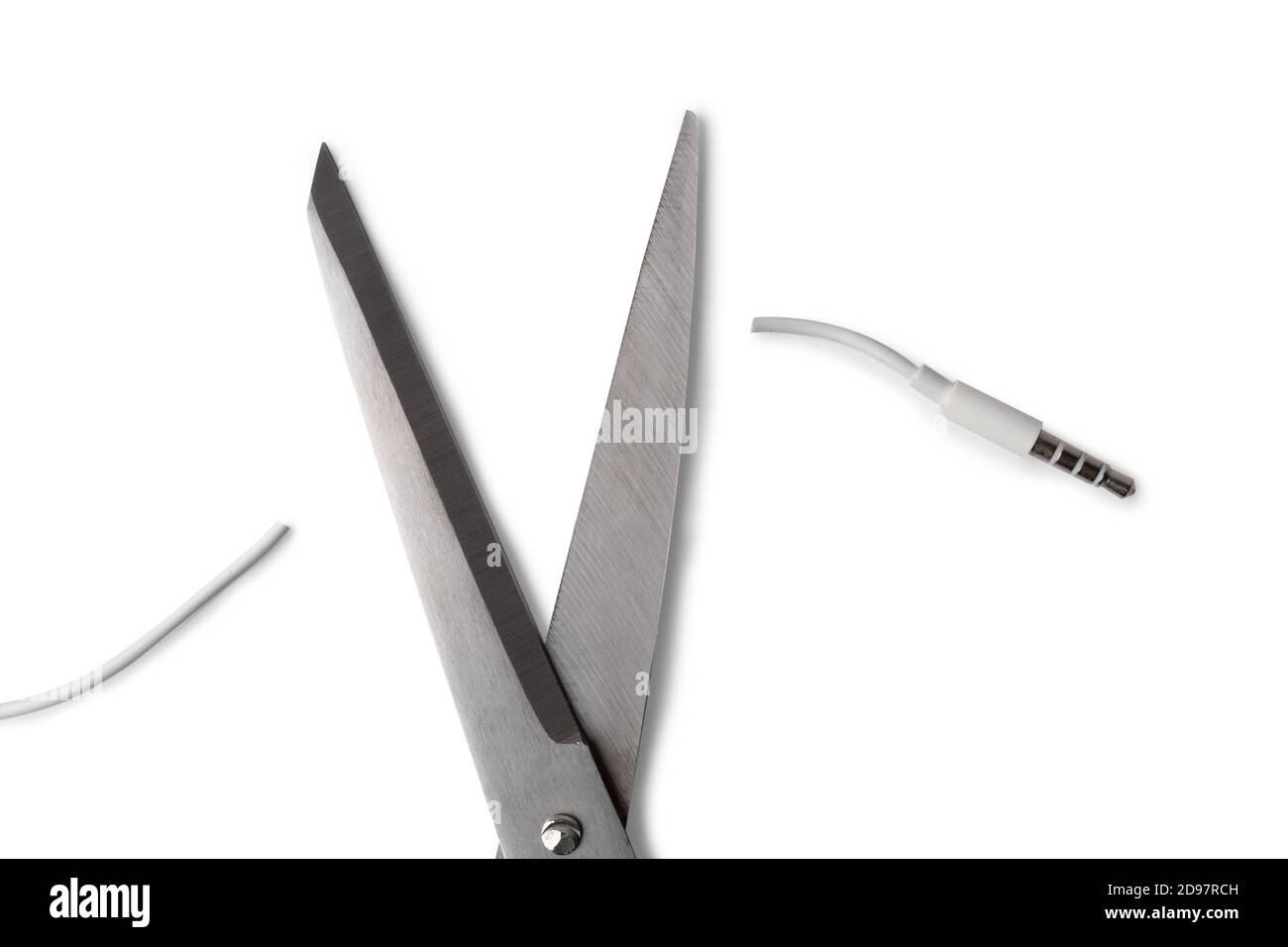 Conceptual photo of cut off the earphones wire. Bluetooth headphones ...