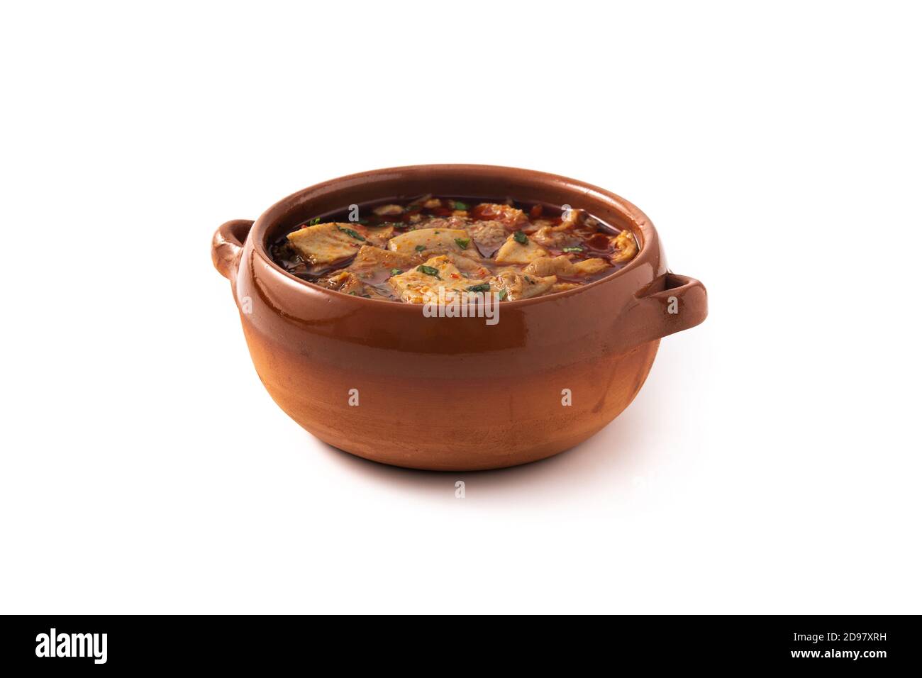 Traditional mondongo or el menudo soup isolated on white background ...