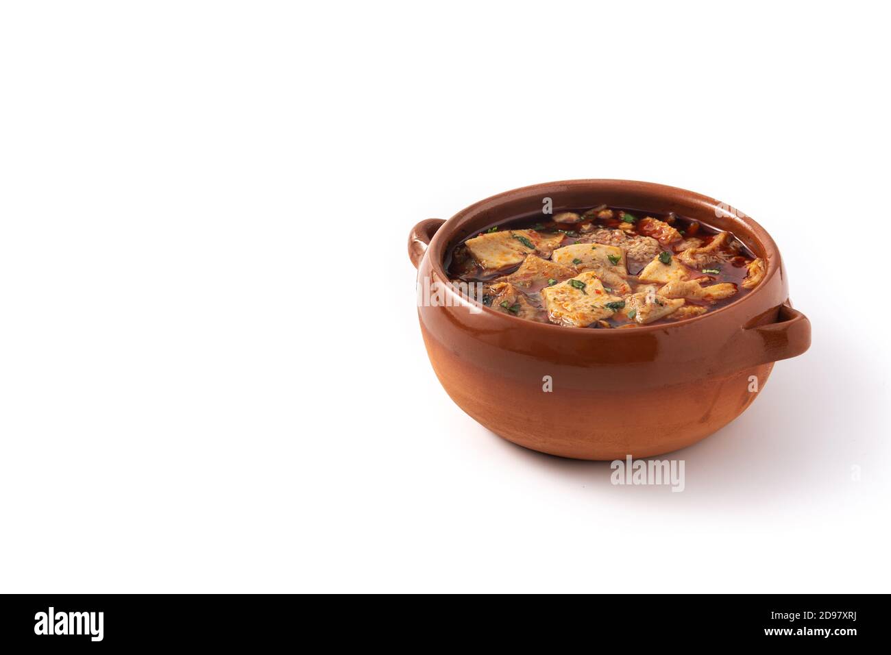 Traditional mondongo or el menudo soup isolated on white background ...