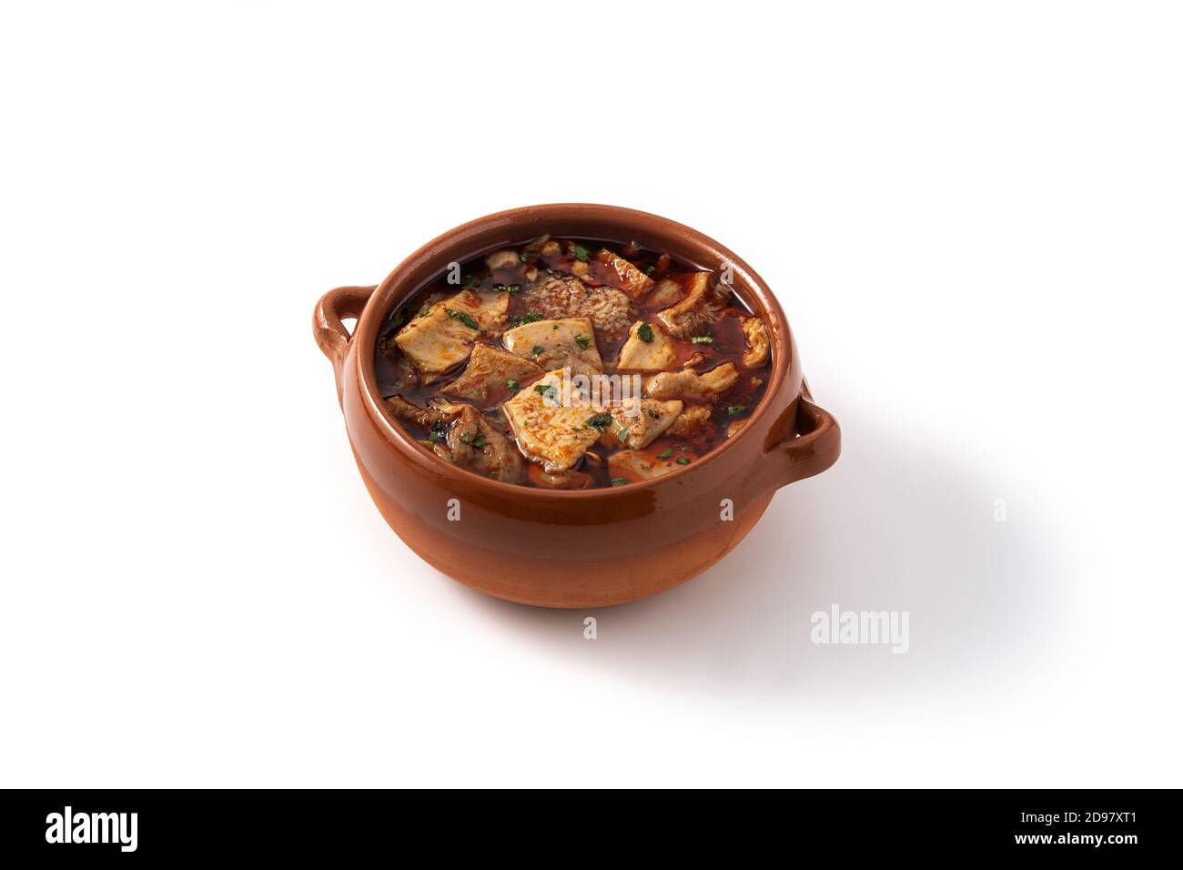 Traditional mondongo or el menudo soup isolated on white background ...