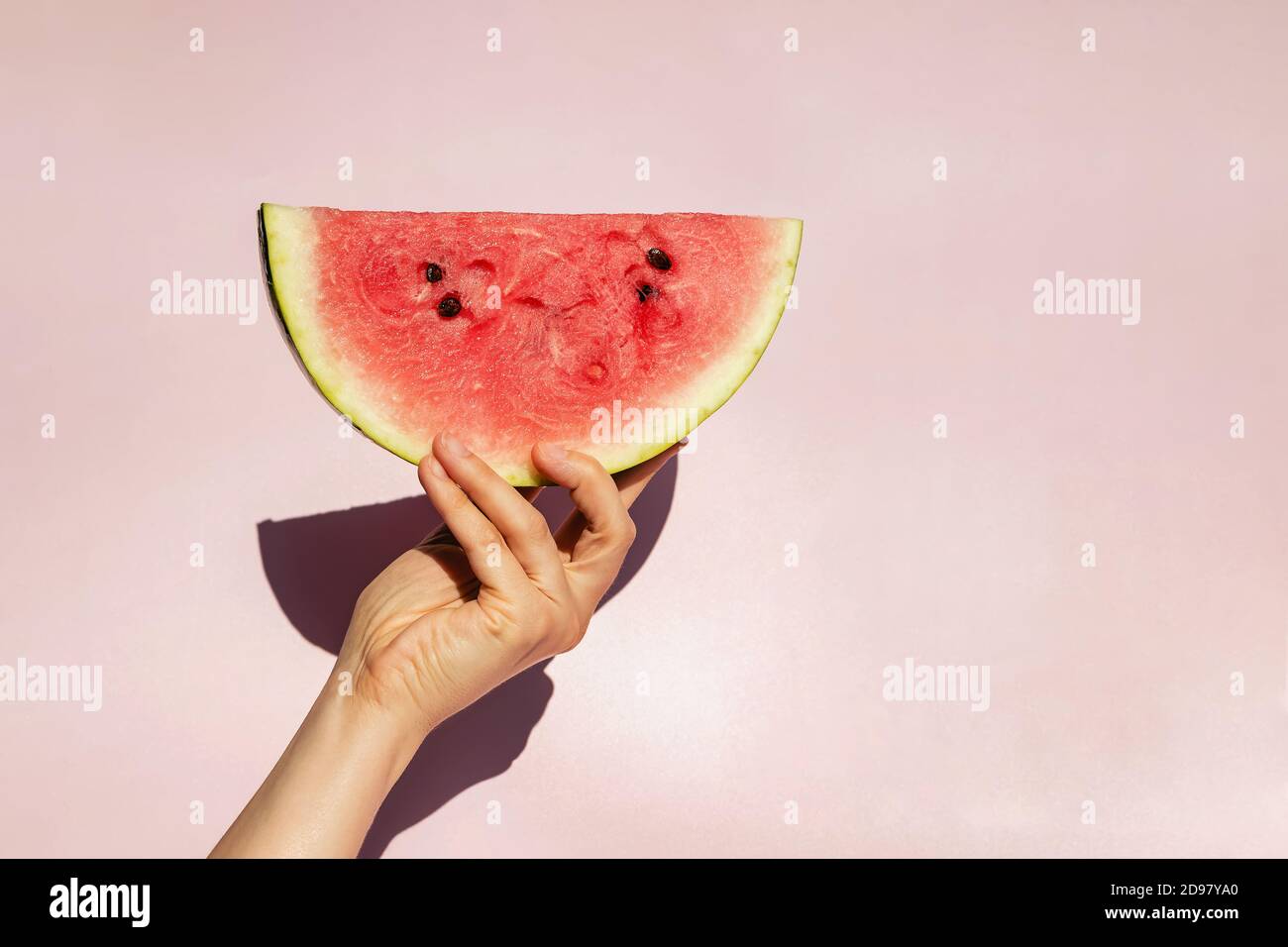 Hand holding melon hi-res stock photography and images - Alamy
