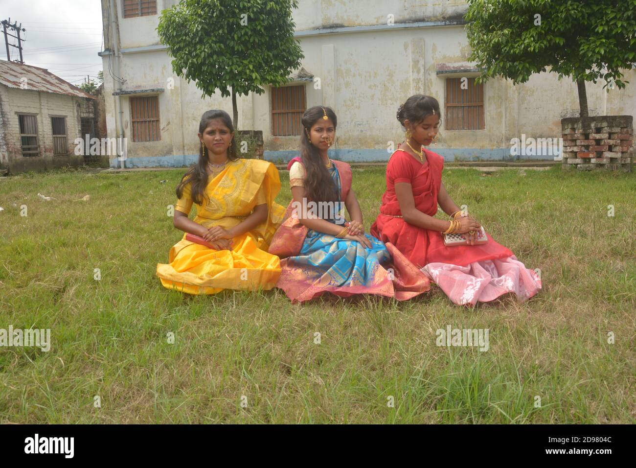 Girl sitting indian style on hi-res stock photography and images - Alamy