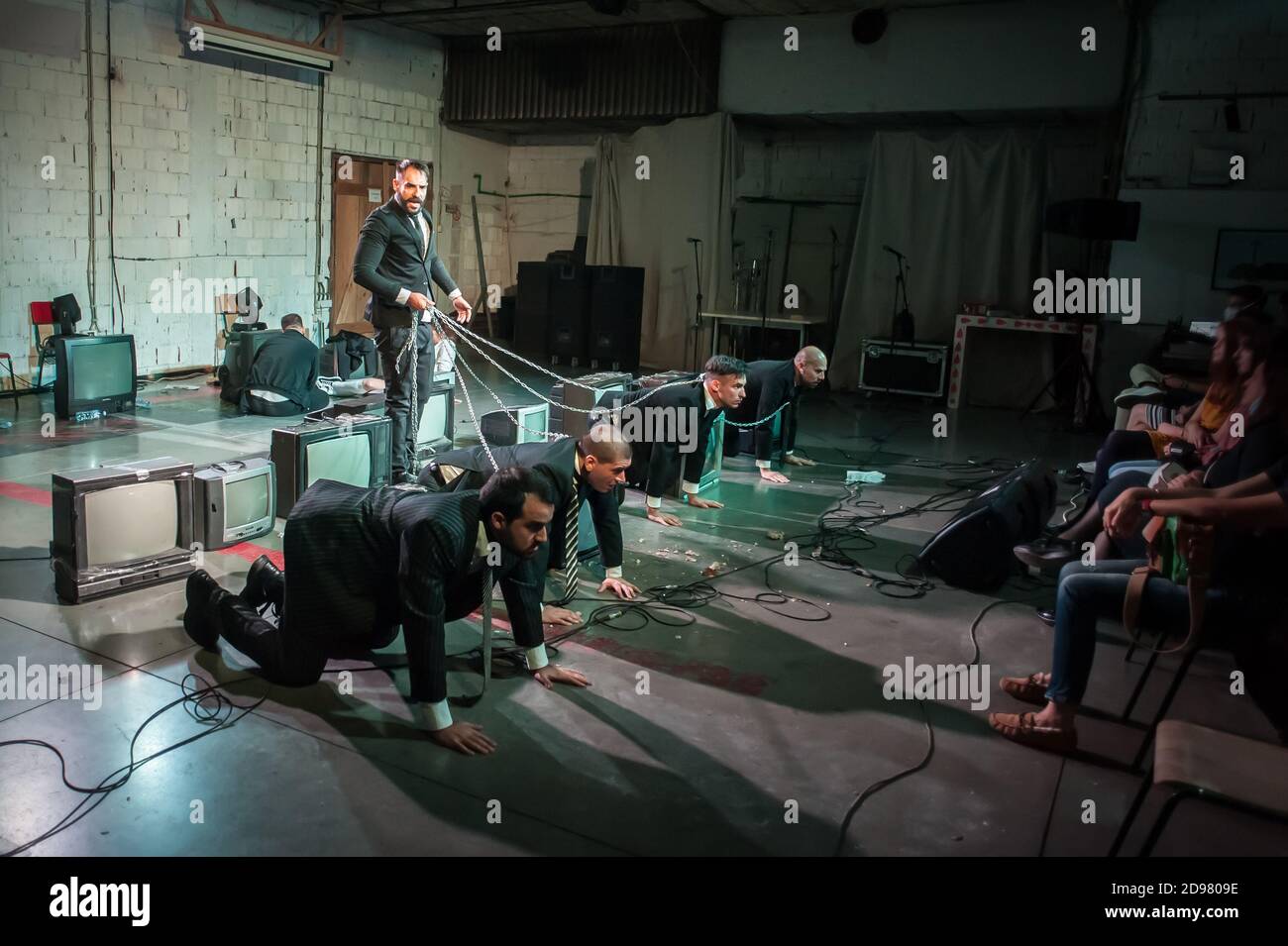 Large group of theater actor artists on stage perform play for audience ...