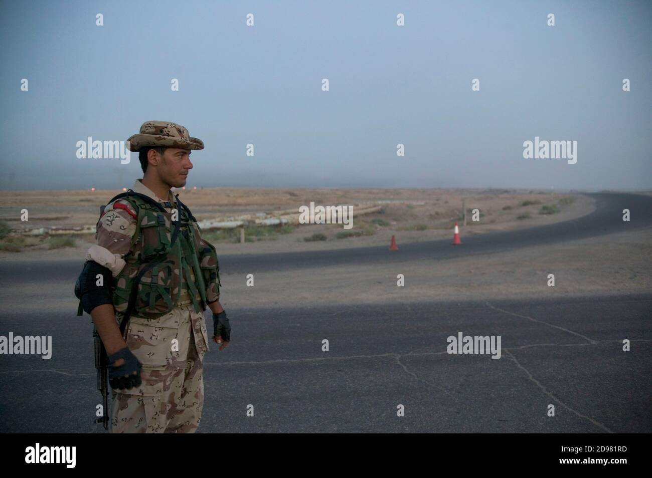 A member of the Iraqi National Guard working with members of 1st ...