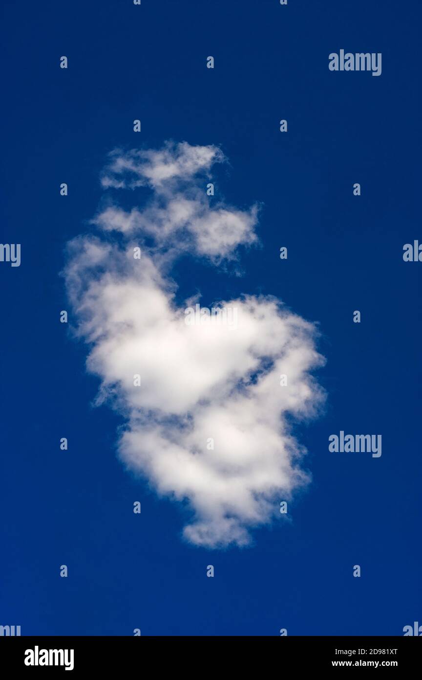 A Lonely Cloud In A Blue Sky Stock Photo - Alamy