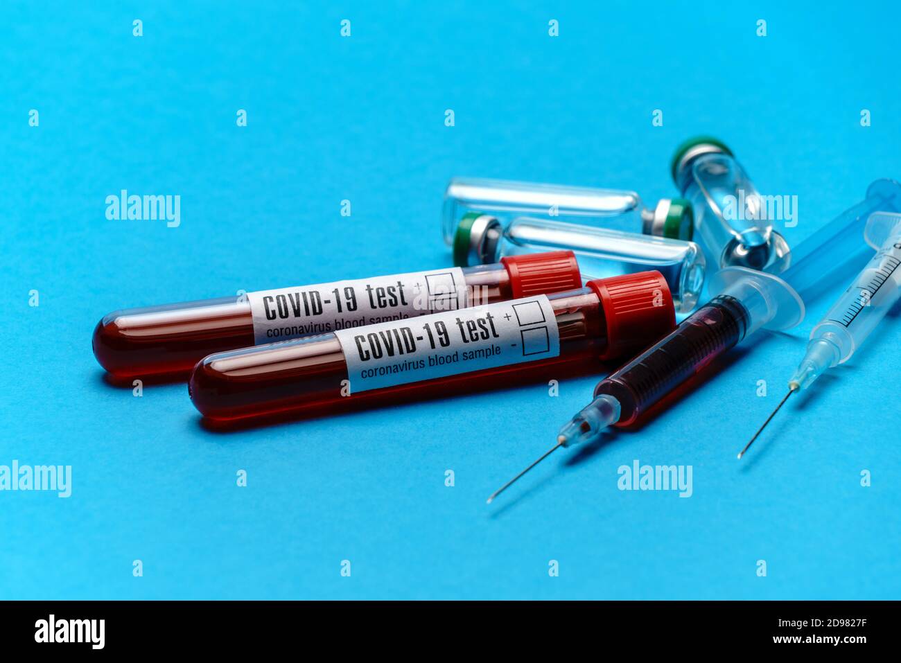 Syringe, test tubes with blood samples and ampoules with medicines or ...