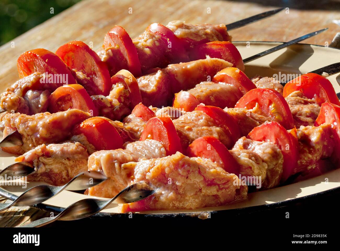Preparation of meat on fire Stock Photo - Alamy