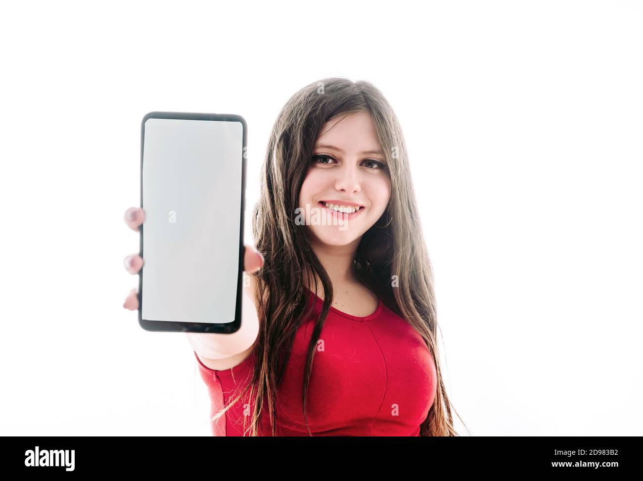 Very Happy Teenage Girl Showing Us The Screen Of Her Smart Phone Stock