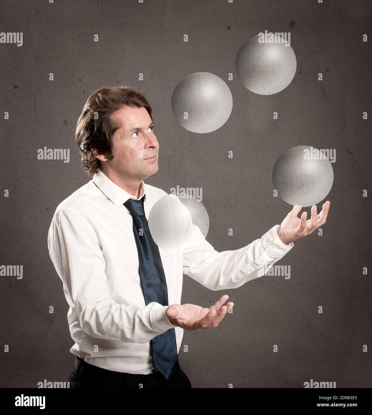 Businessman juggling with balls hi-res stock photography and images - Alamy