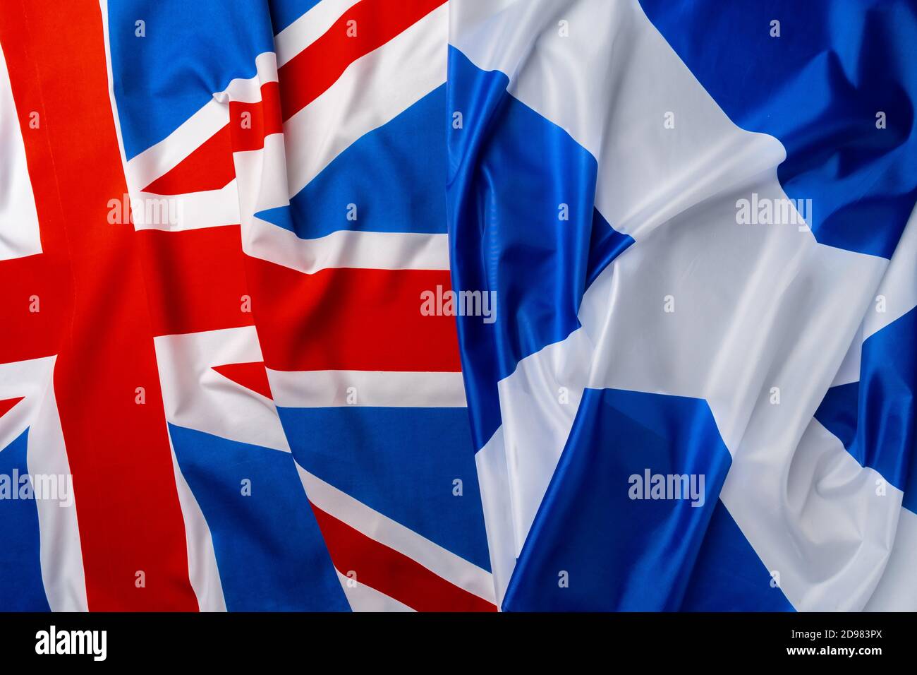 Flags of UK and Scotland folded together Stock Photo - Alamy