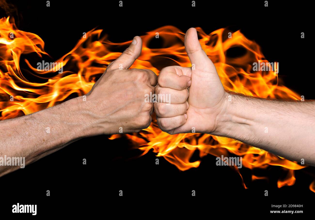 Friendship sealed with fire concept. Two men bumping fists with thumbs ...