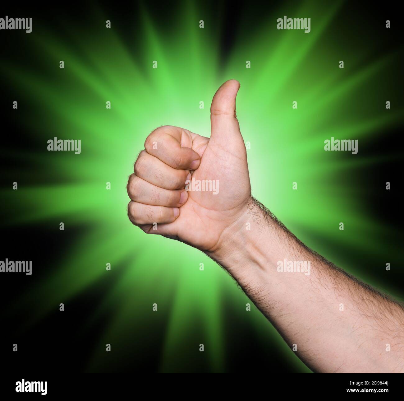 Tumb up sign on abstract green star background Stock Photo - Alamy