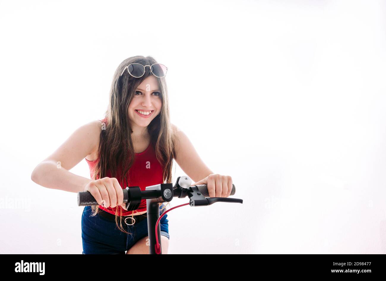 Girl driving an electric scooter with a speed face. Photography with ...