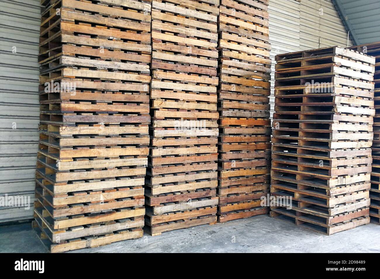 Stack of wooden pallets at warehouse. Transportation logistic business ...