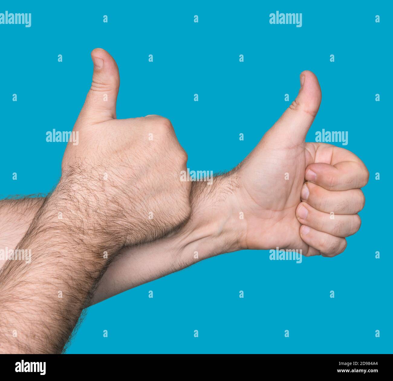 Body part. Thumbs up sign. Isolated on blue background. Focus on the ...