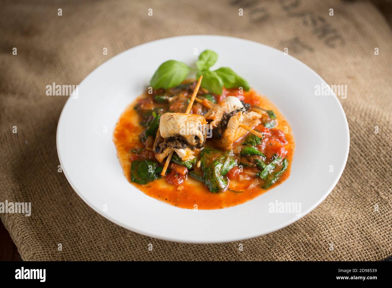 Fish tomato sauce hi-res stock photography and images - Alamy