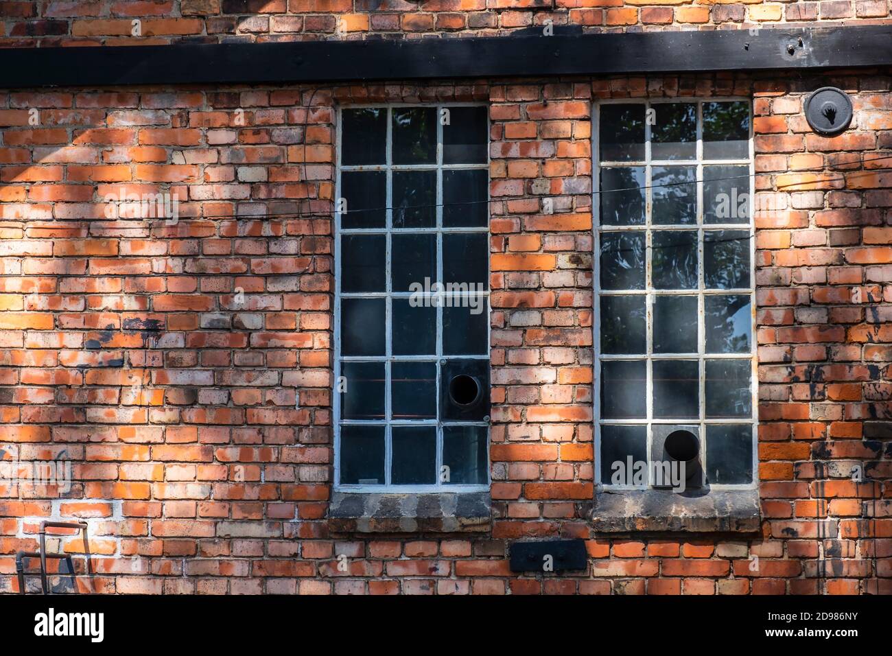 Windows at an old industrial building in brickstone Stock Photo - Alamy