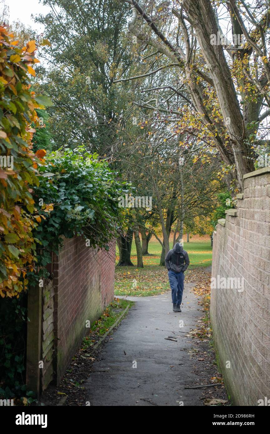 Boy down narrow alley in hi-res stock photography and images - Alamy