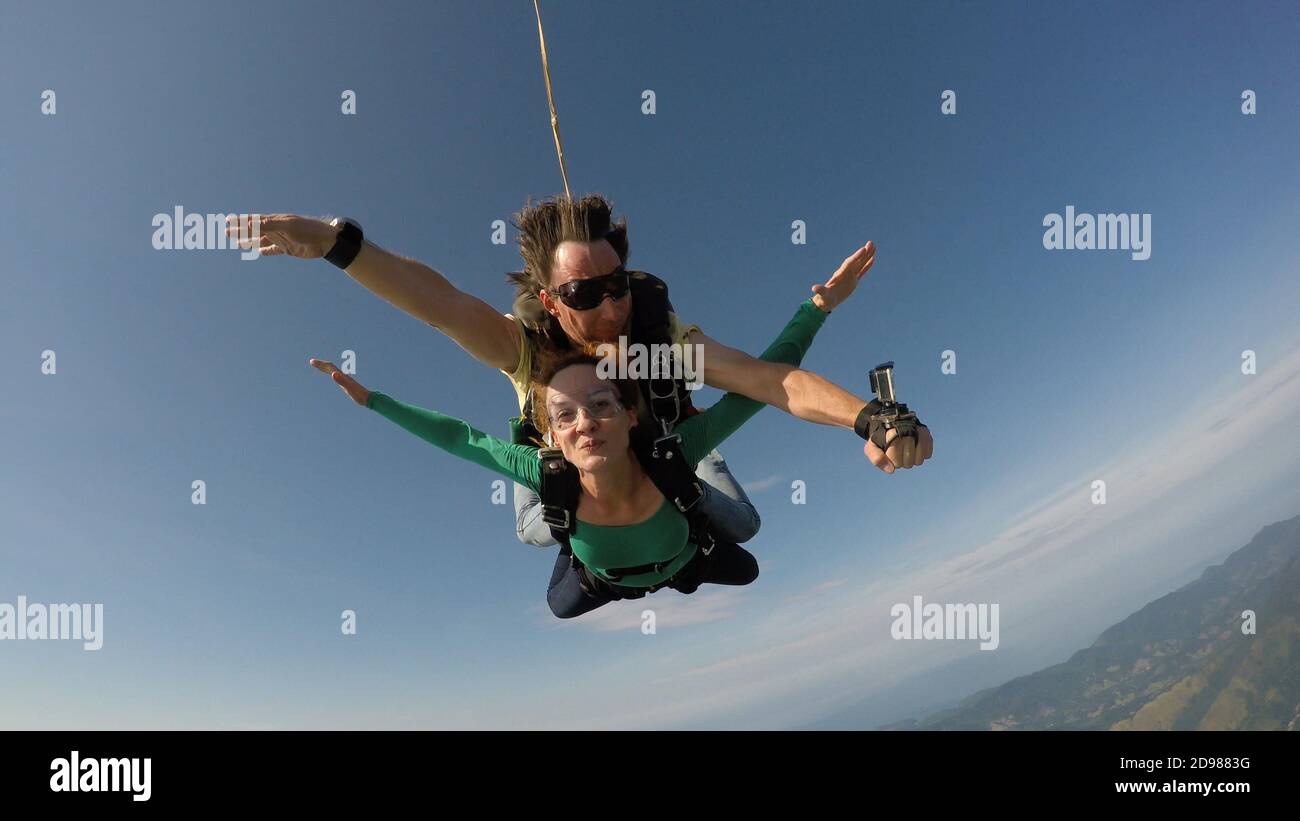 Tandem skydive female hi-res stock photography and images - Alamy