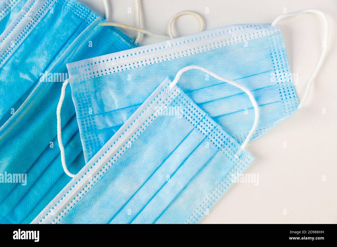 Blue face masks on the white background, sterile protection Stock Photo ...