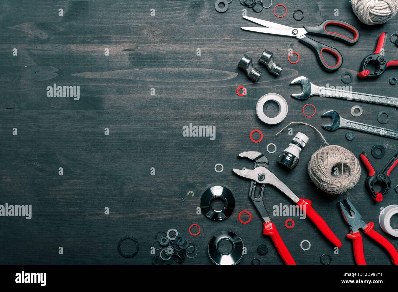 Plumbing tool set on working desk, top view flat lay objects with copy ...