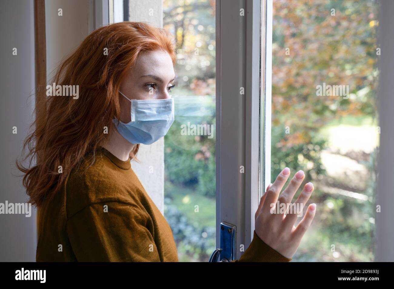Sad woman at home during coronavirus pandemic Stock Photo - Alamy