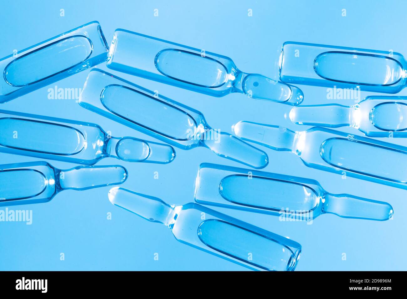 Medical background of ampule vials for injections Stock Photo - Alamy
