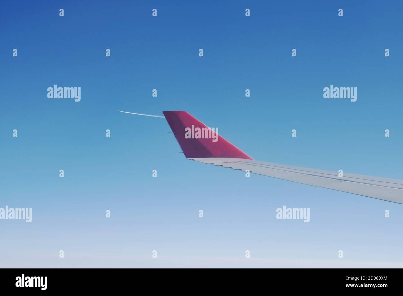 plane wing and cloud floating on sky through window frame Stock Photo ...