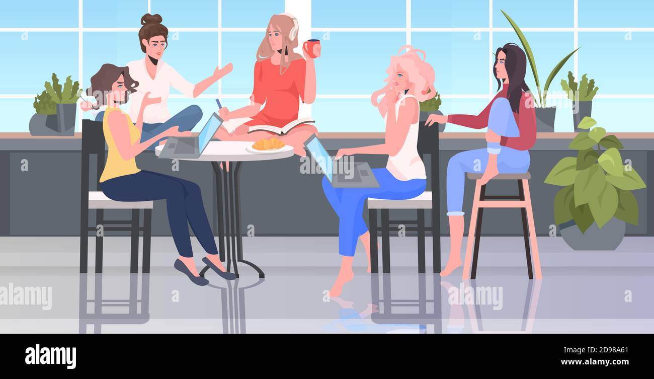 women discussing during meeting in conference area female empowerment ...