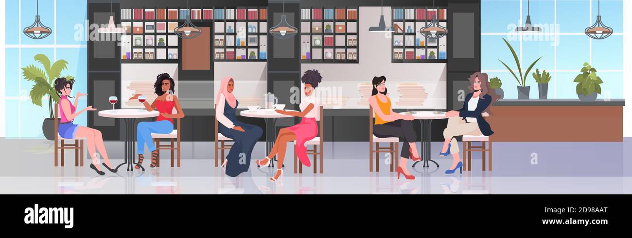 mix race women discussing during meeting in conference area female ...