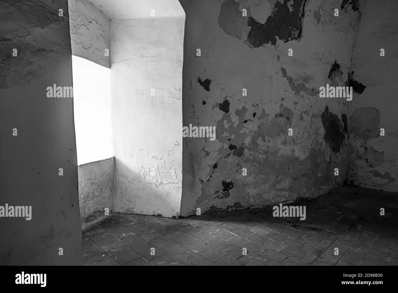 Abandoned dilapidated room with a window Stock Photo - Alamy