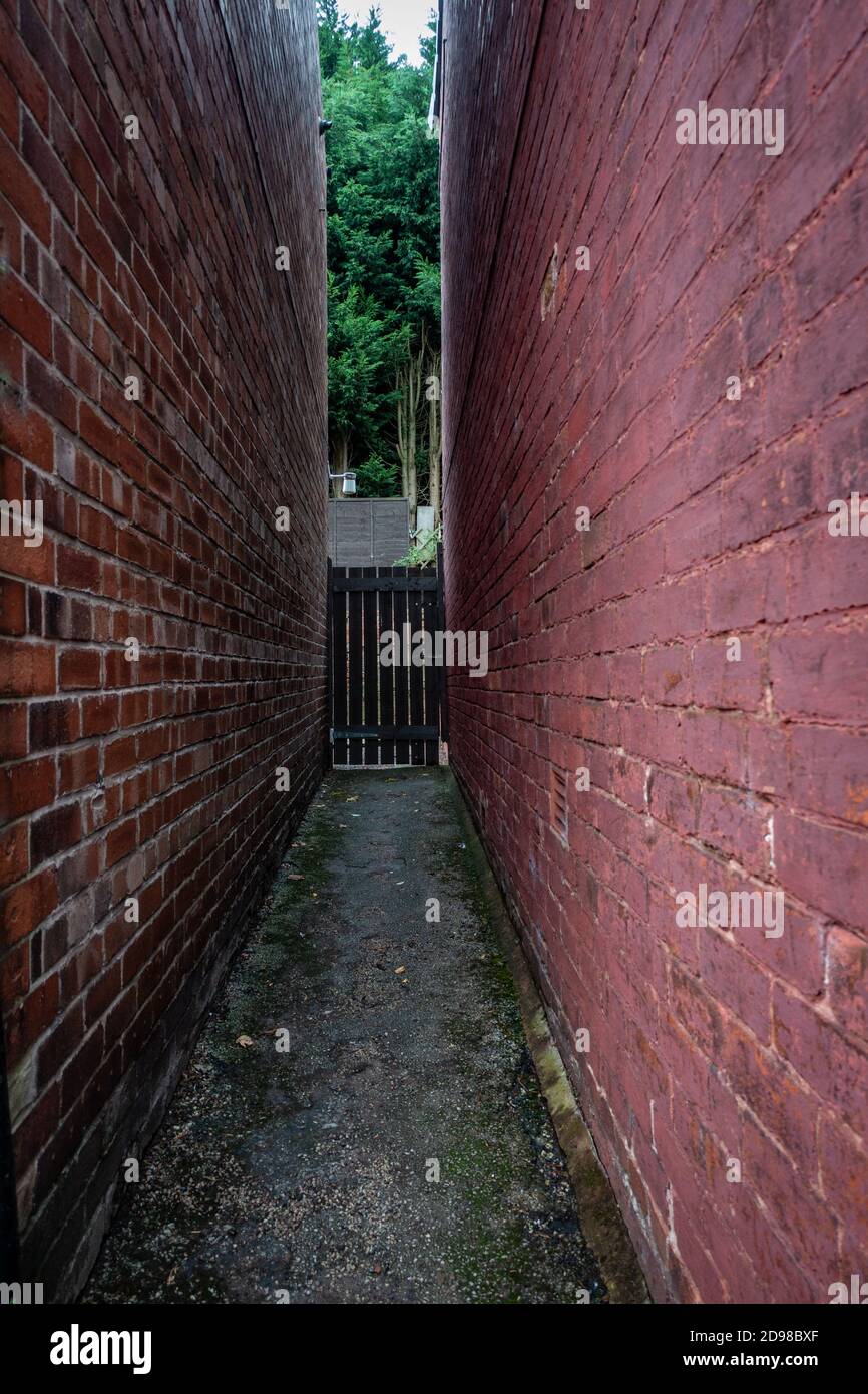 Pathway between houses hi-res stock photography and images - Alamy