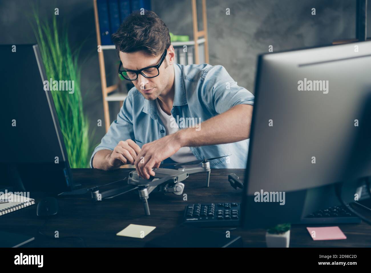 Photo of smart expert guy repairman master fix airplane drone use ...