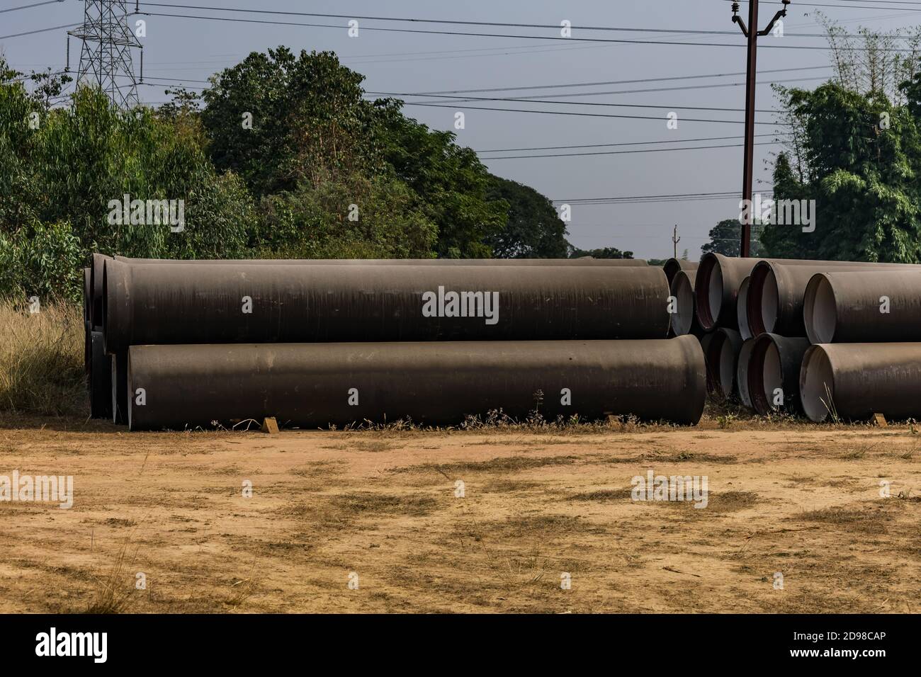 ductile iron pipes stocked in open space of a rural village store yard ...