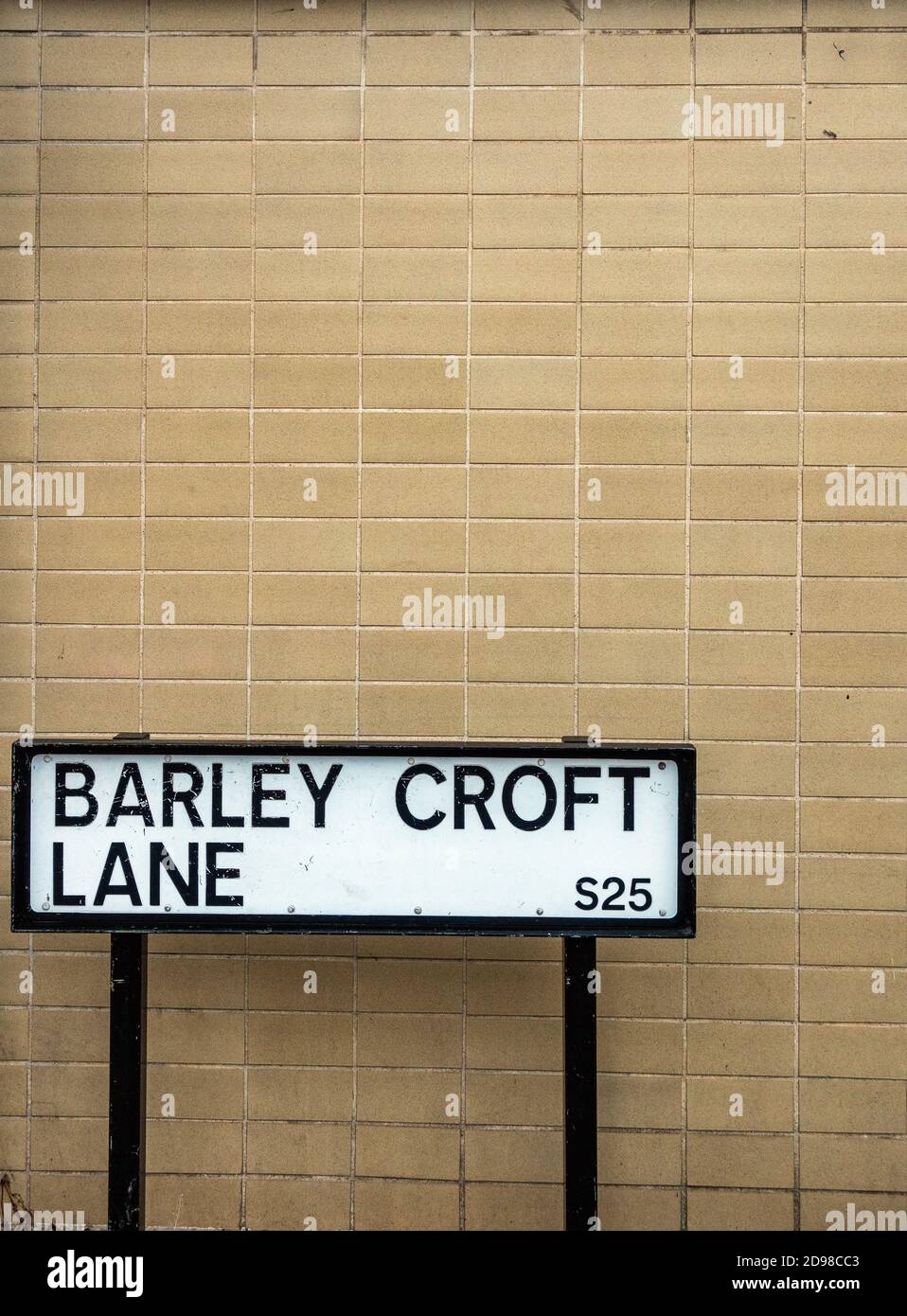 Barley Croft Lane street sign in metal against a cream painted brick ...