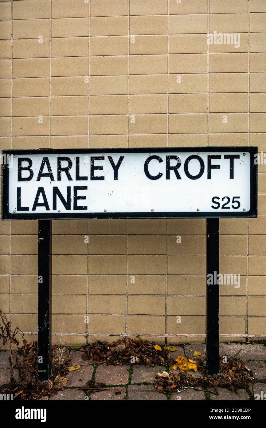 Barley Croft Lane street sign in metal against a cream painted brick ...