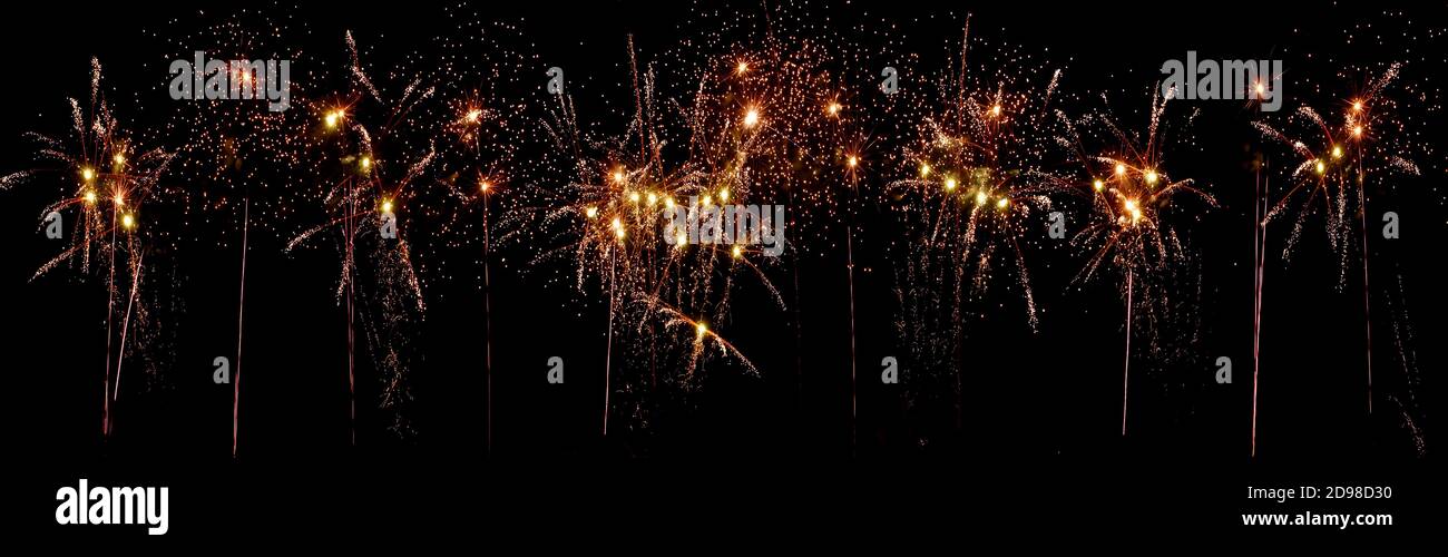 Colorful explosions and crackling fireworks Stock Photo - Alamy