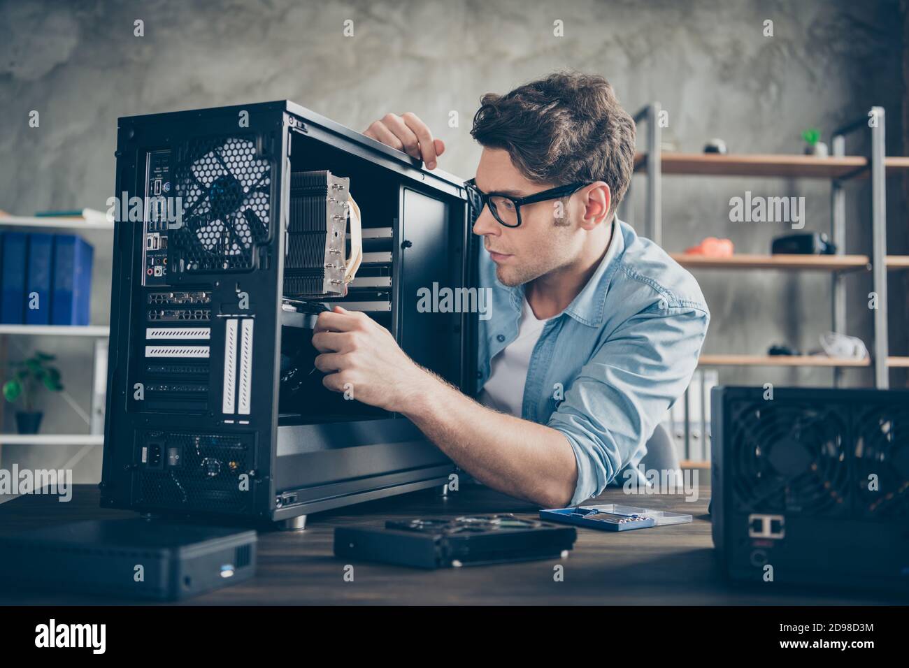Serious office worker testing hi-res stock photography and images - Alamy
